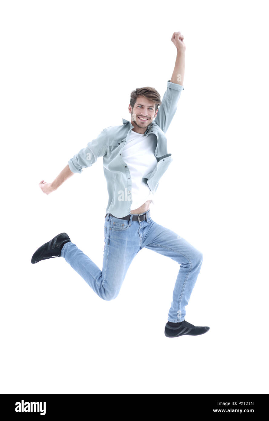 Happy man jumping in air over white background Stock Photo - Alamy