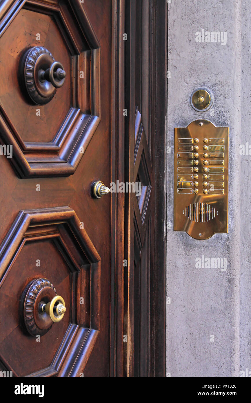 Door intercom and bell buttons in brass Stock Photo - Alamy