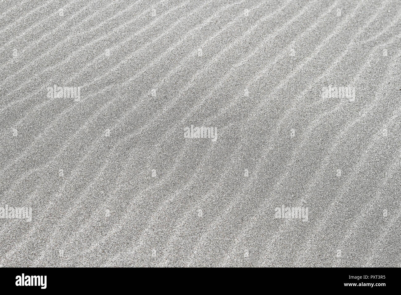 Granular grey sand dunes with diagonal pattern Stock Photo - Alamy