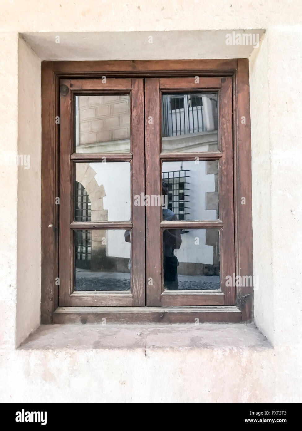 Small wooden window in historic building. Studio Photo Stock Photo - Alamy