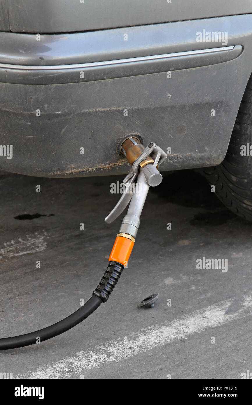 Fueling car with lpg autogas at petrol station Stock Photo - Alamy