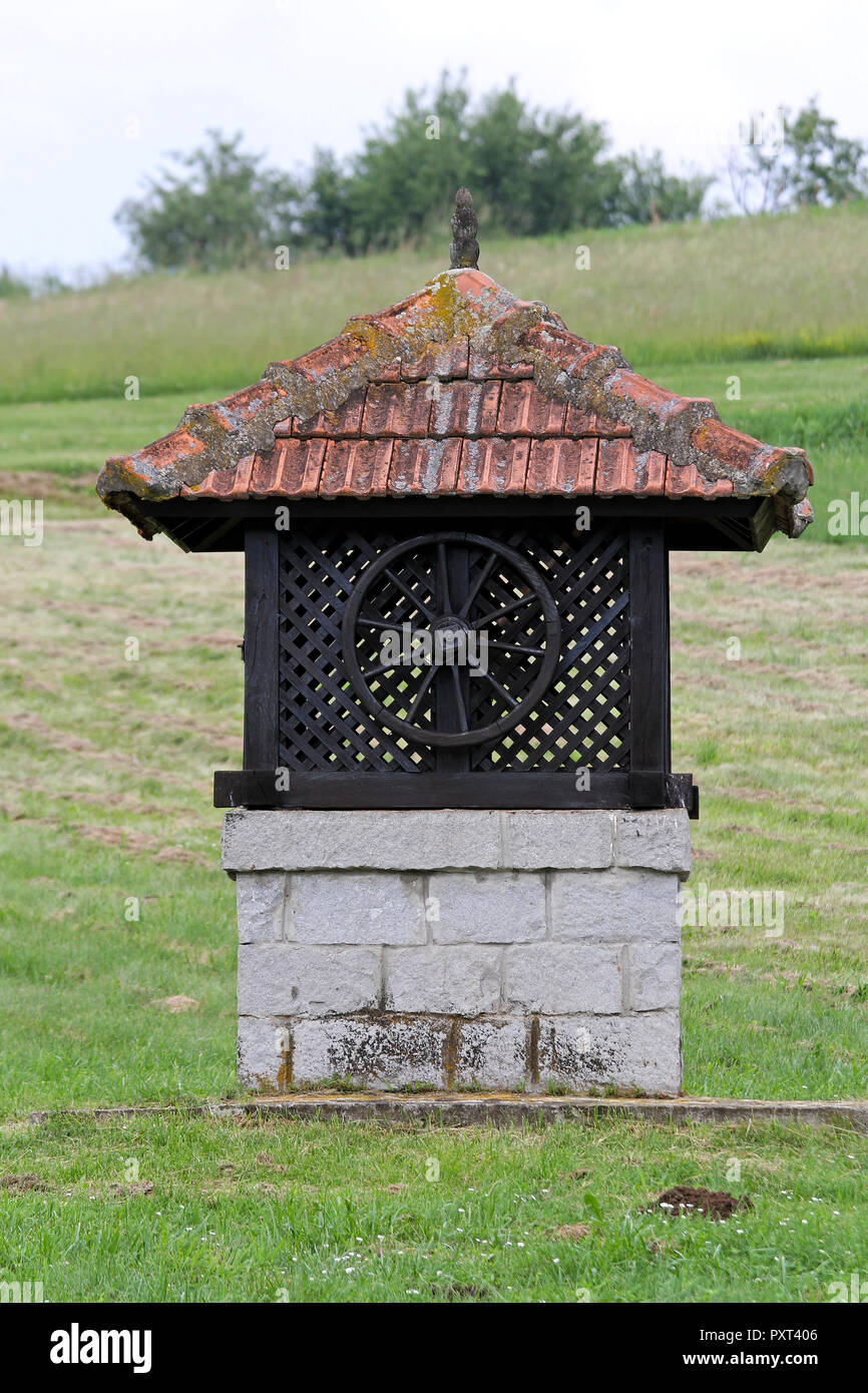Very old water well with manual pump Stock Photo - Alamy