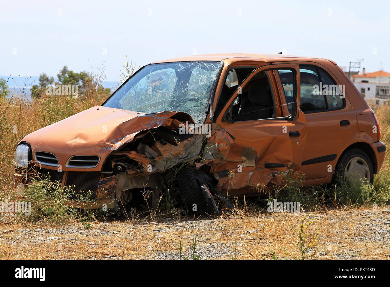 Crushed small car in bad traffic accident Stock Photo - Alamy