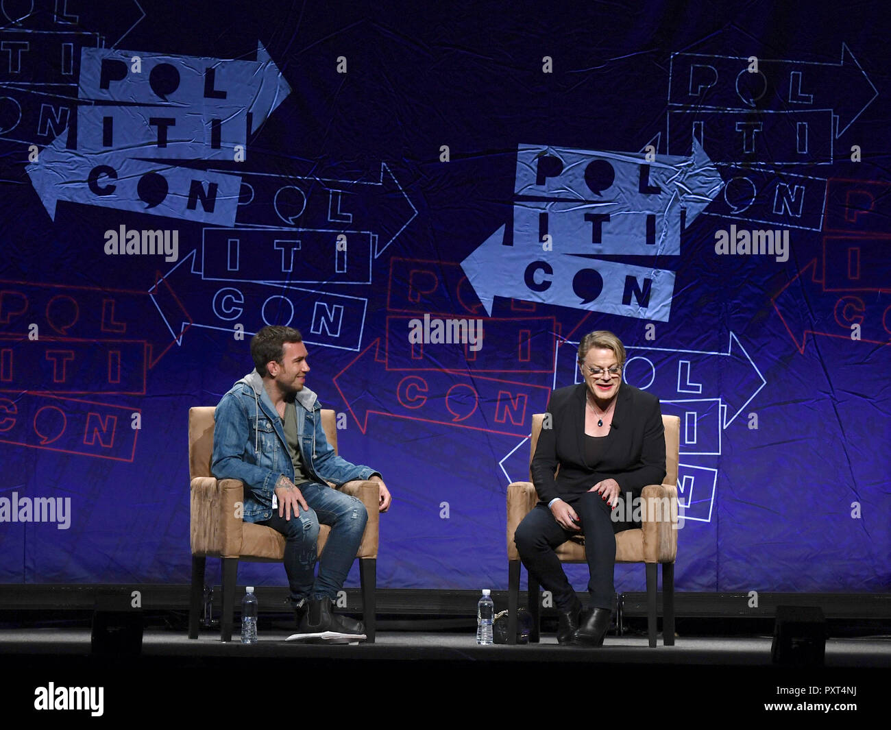 Jamie Kilstein and Eddie Izzard speak on stage at Politicon 2018 at the ...