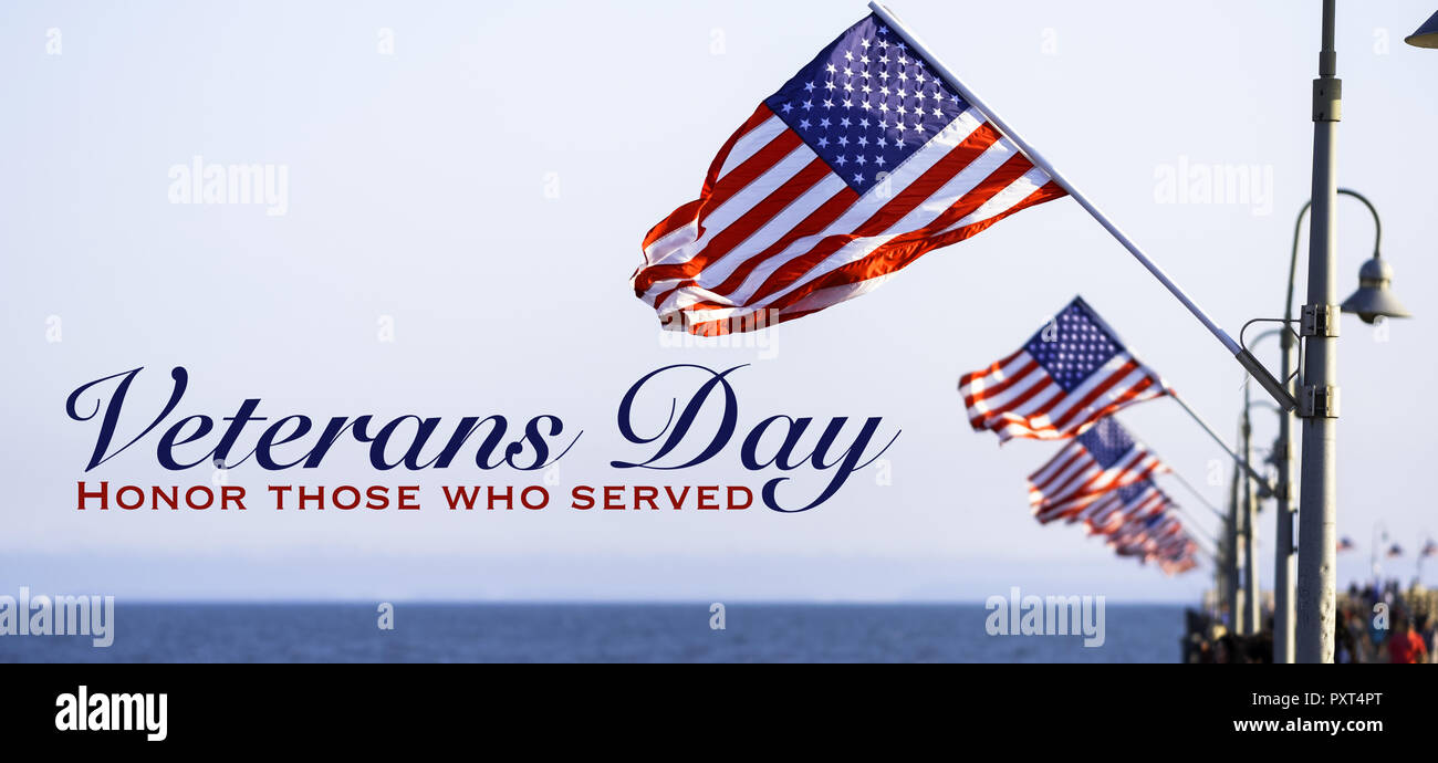American flags with a Veterans Day greeting Stock Photo - Alamy