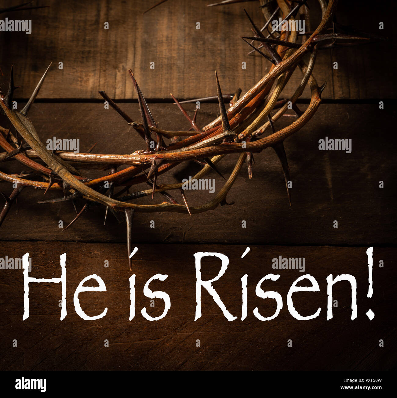 A crown of thorns on a wooden background. Easter Theme Stock Photo - Alamy