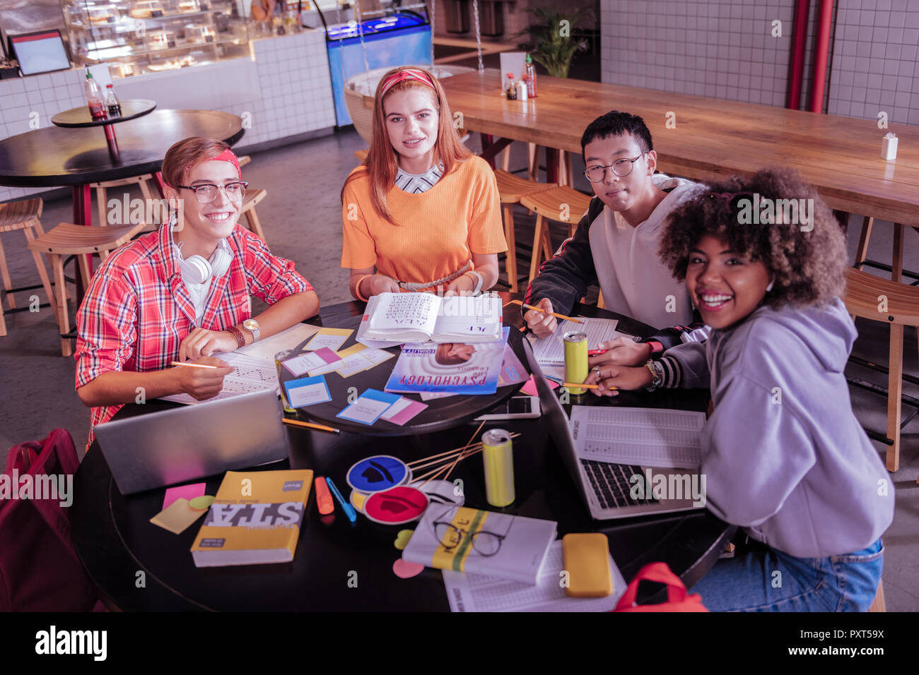 Group of happy classmates that studying together Stock Photo - Alamy