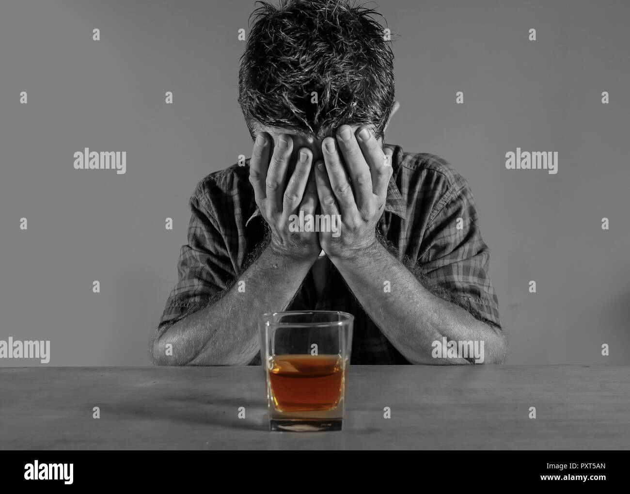 isolated black and white portrait of young messy depressed alcoholic ...