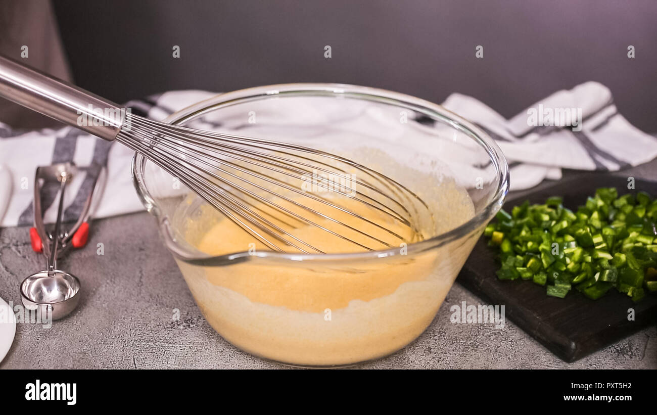 Step by step. Mixing ingredients together in glass mixing bowl for ...