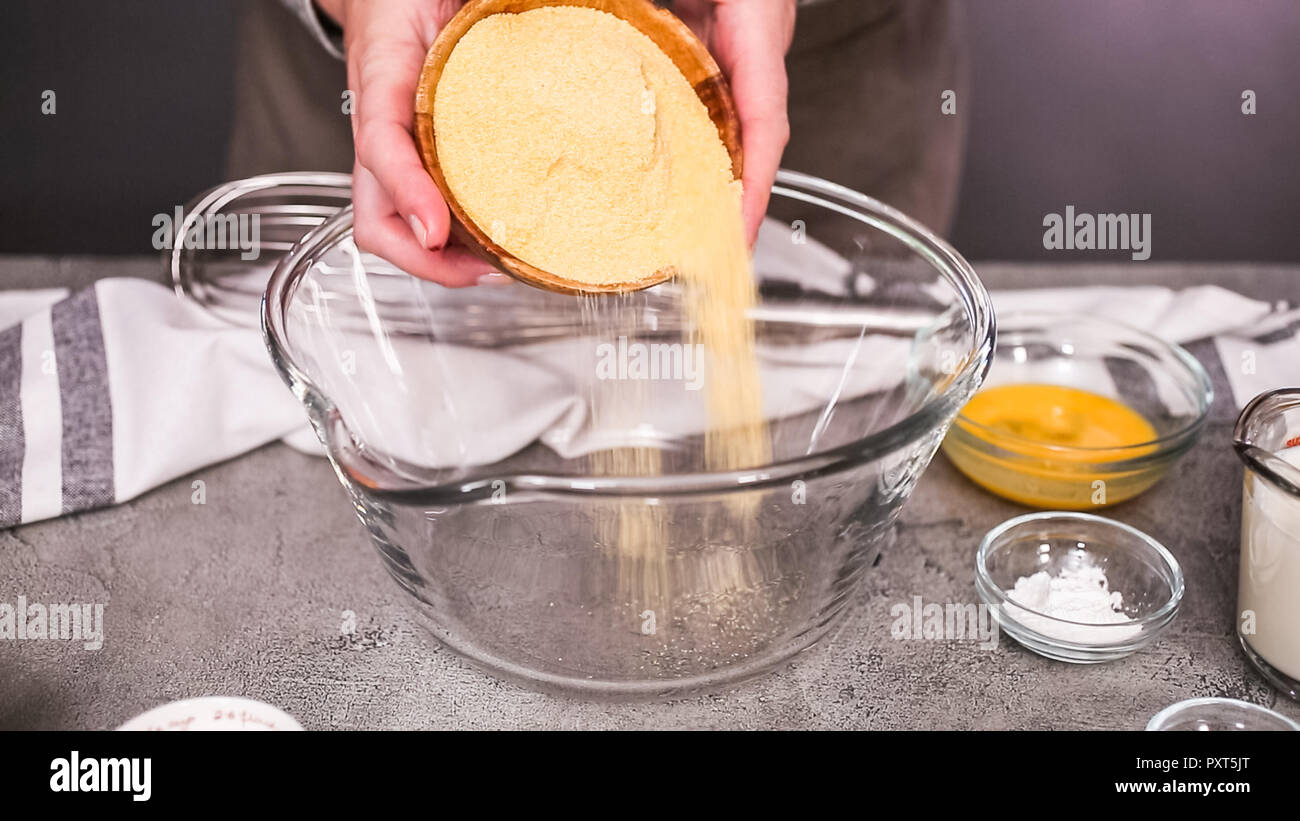 Step by step. Mixing ingredients together in glass mixing bowl for ...