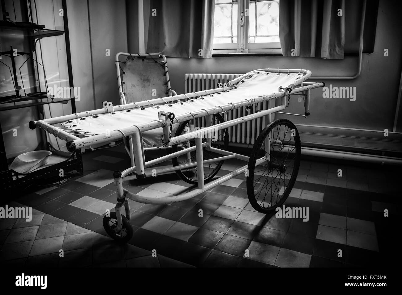 Old medical stretcher bed Black and White Stock Photos & Images - Alamy