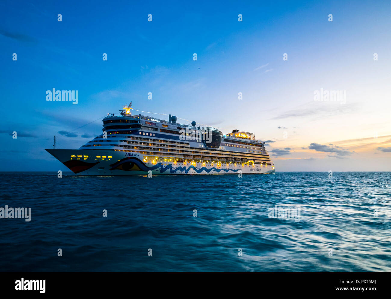 Cruise ship Aidaluna off the coast, sunset, Belize Stock Photo - Alamy