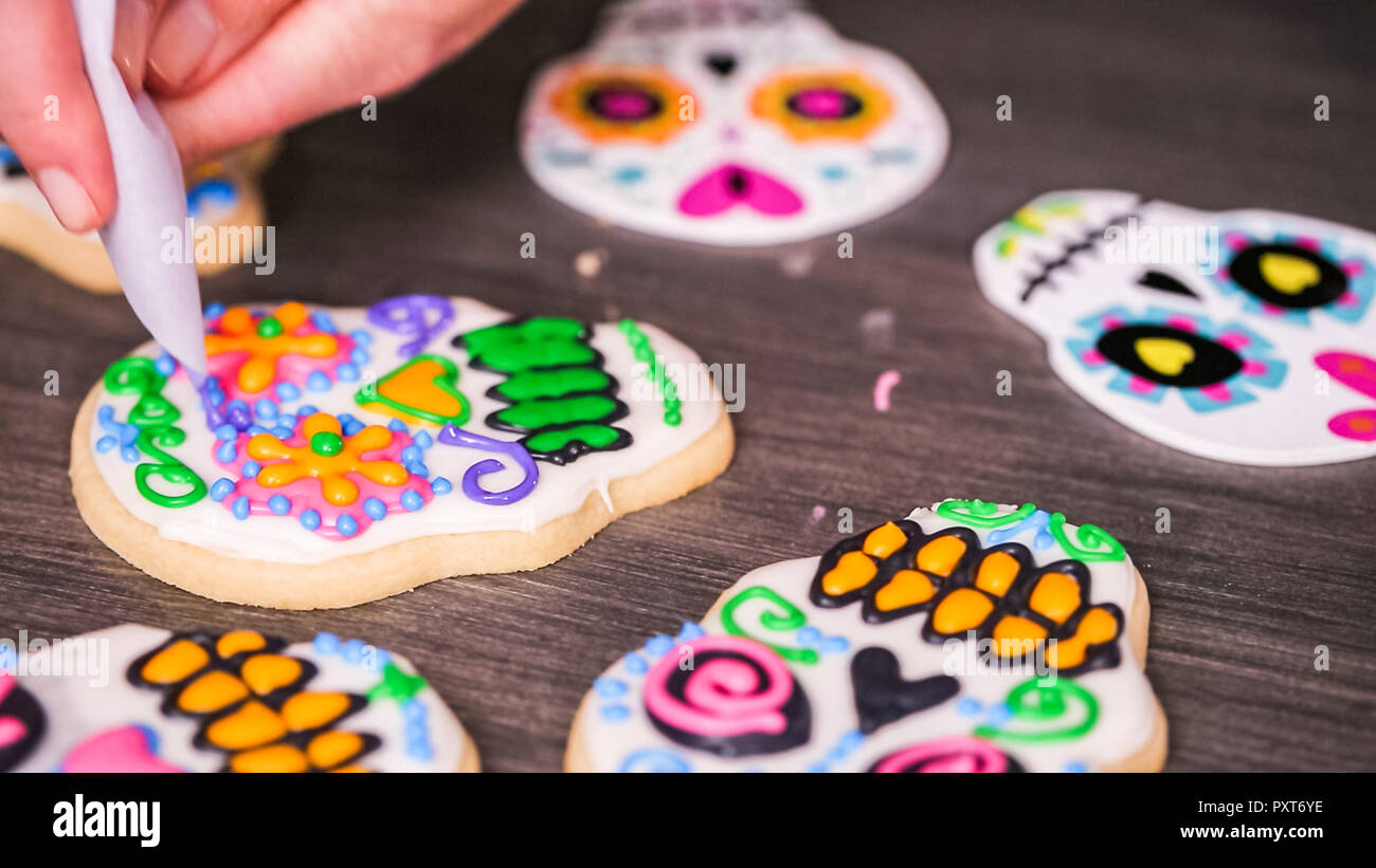 Step by step. Decorating sugar skull cookies with different color royal ...