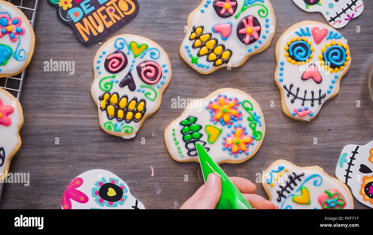 Step by step. Flat lay. Decorating sugar skull cookies with different ...