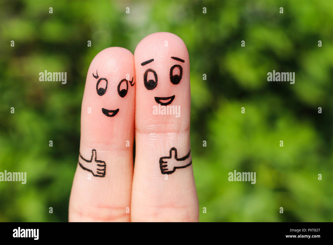 Finger art of a Happy couple. Happy couple showing thumbs up Stock ...