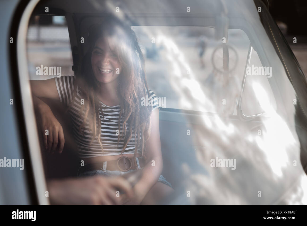 happy beautiful woman inside a car Stock Photo - Alamy