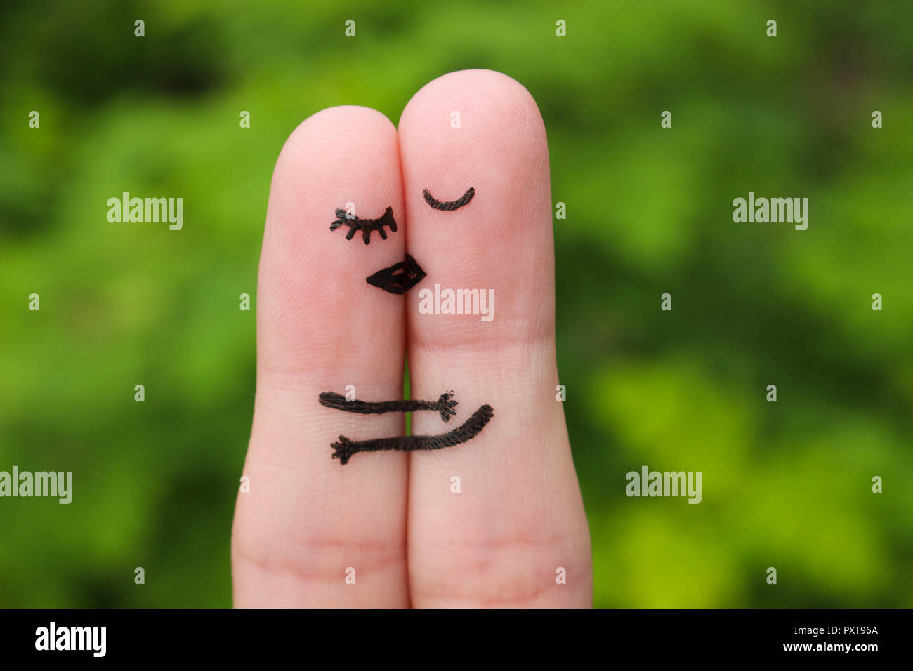 Finger art of happy couple kissing and hugging Stock Photo - Alamy