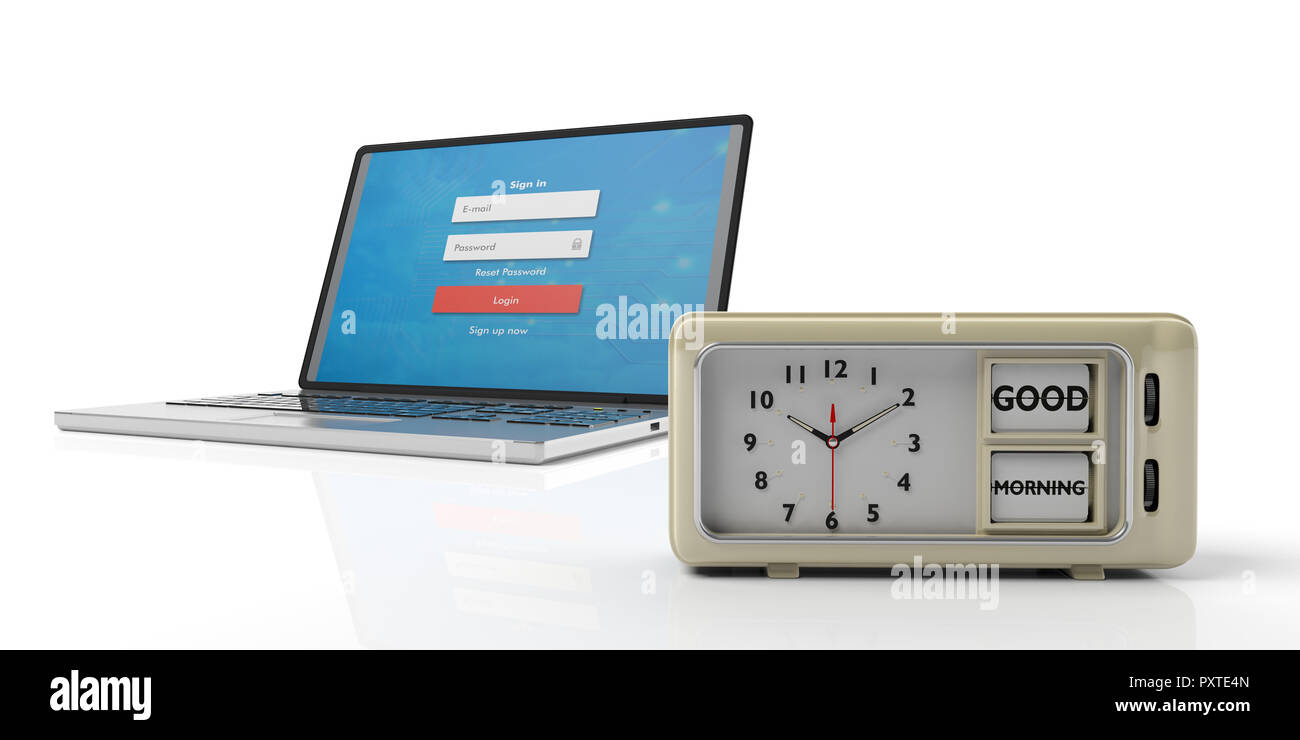Good morning wake up message on retro vintage alarm clock and a laptop ...
