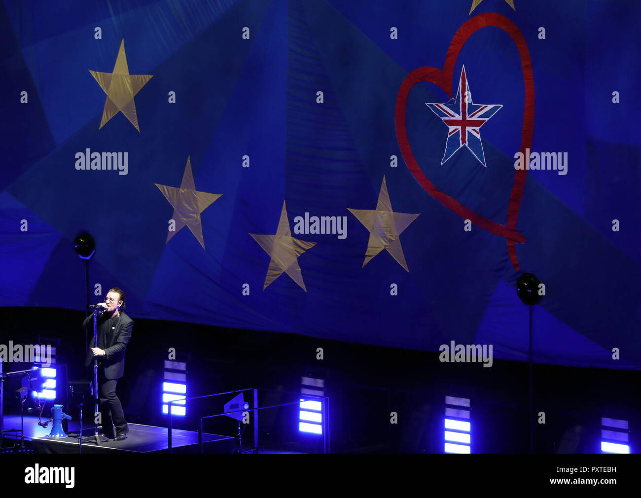 U2's Bono performs in front of a giant EU flag, with one star as the ...