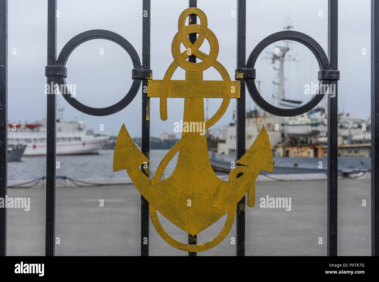 Naval symbols on the metal railing of the dock warships. Vladivostok ...