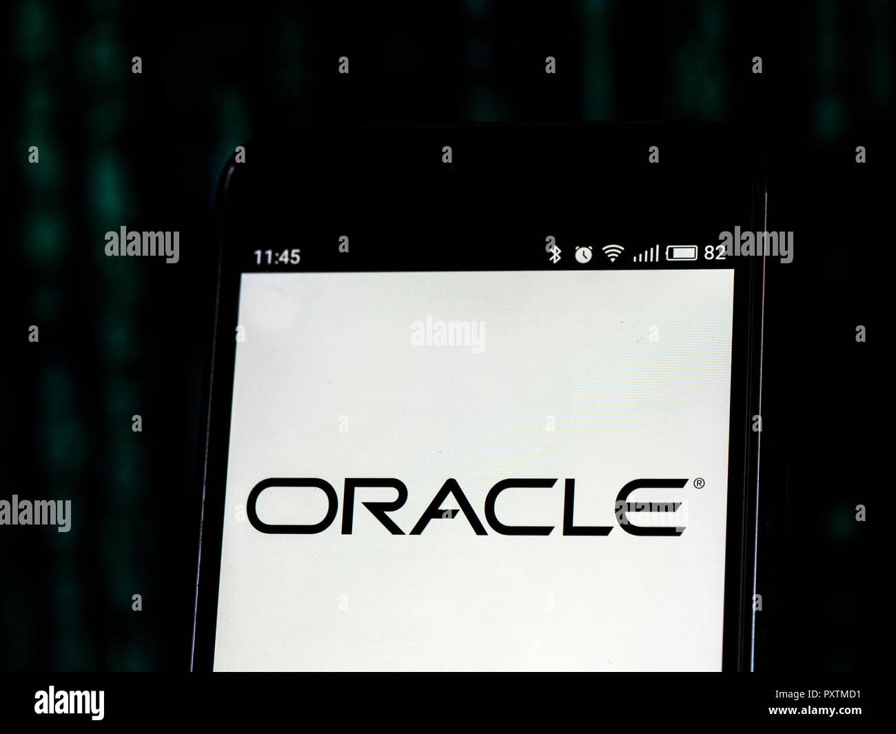 Oracle Corporation logo seen displayed on smart phone. Oracle ...