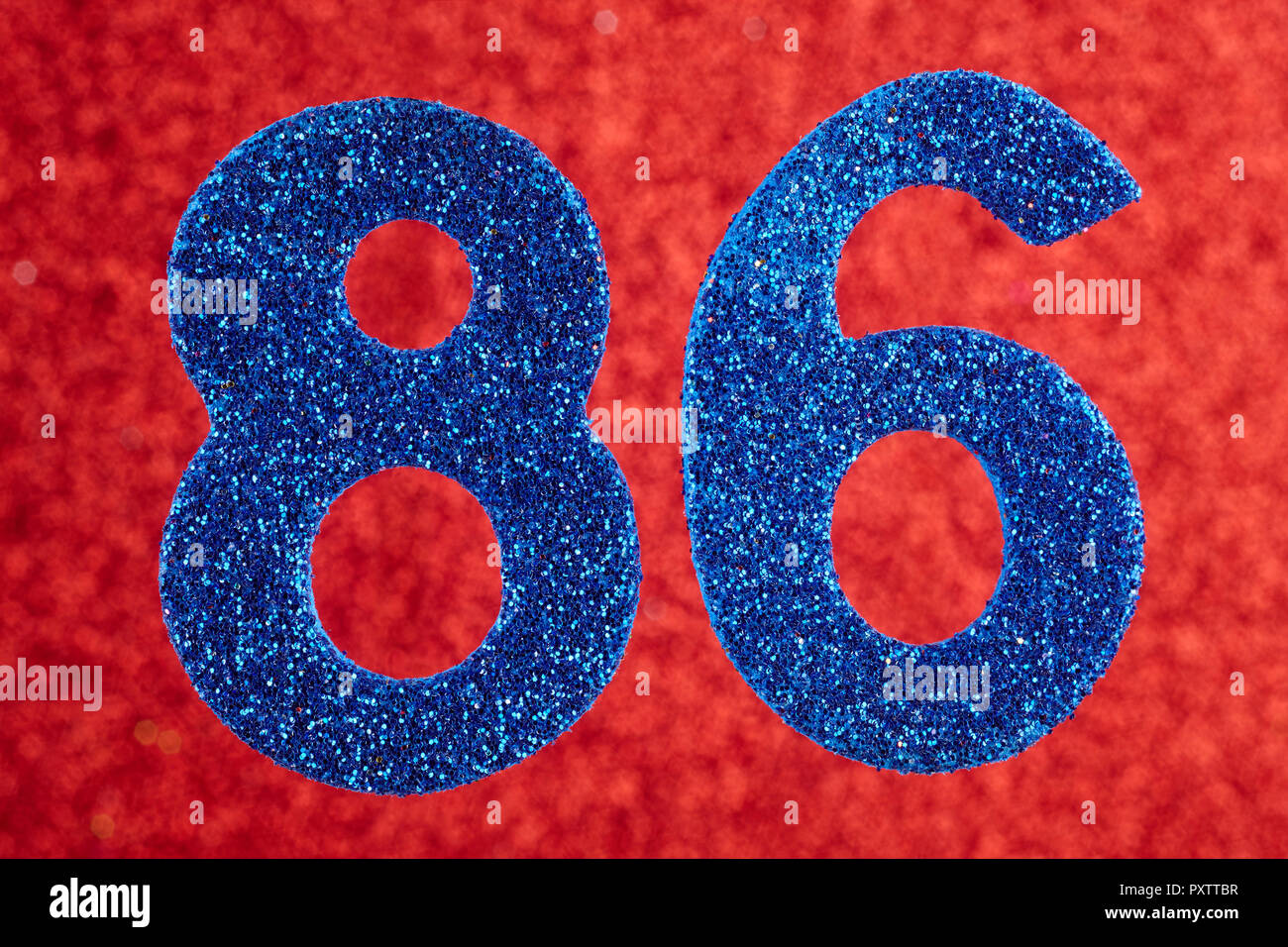 Number eighty-six blue color over a red background. Anniversary ...