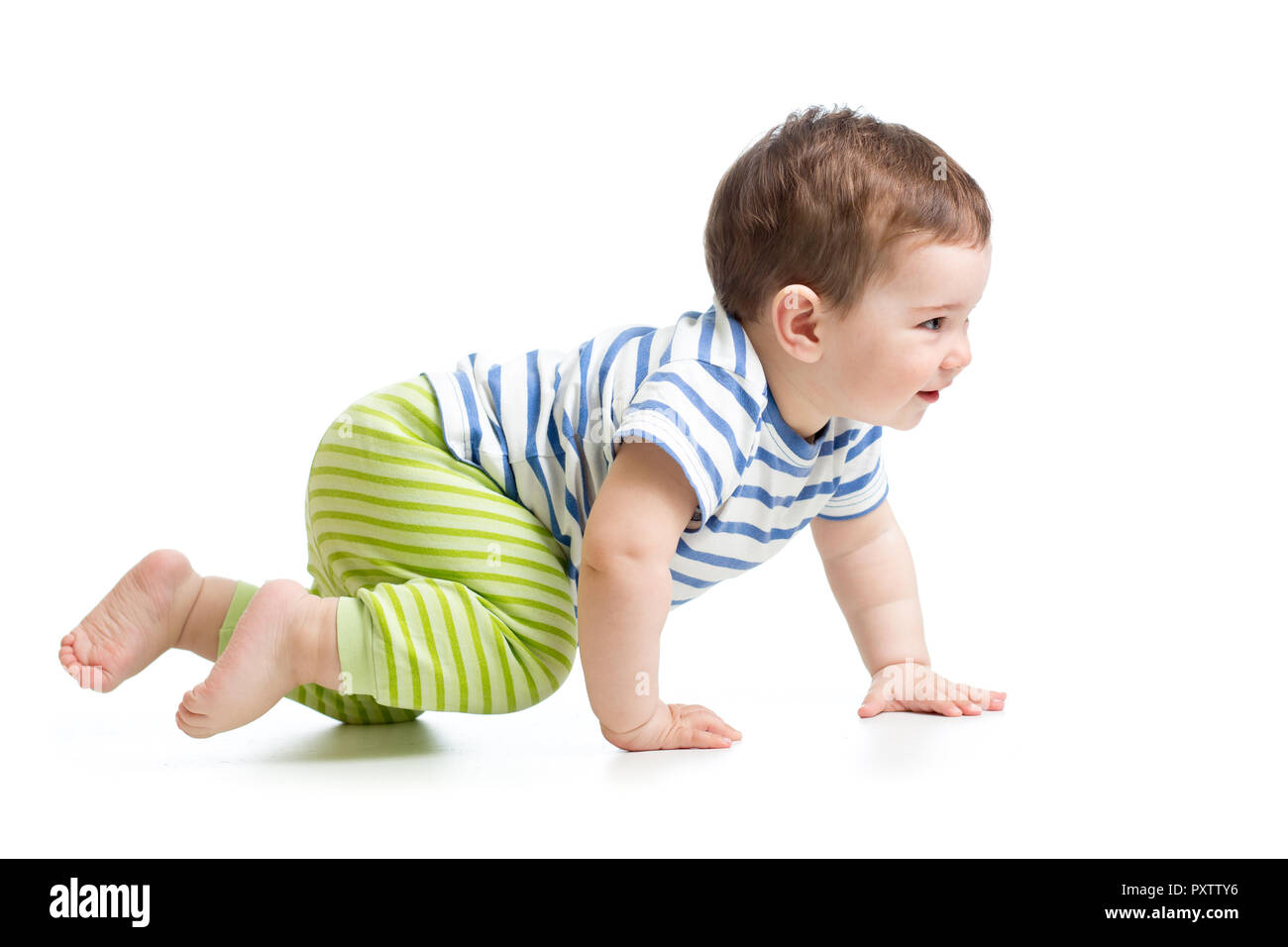 side view of baby boy crawling isolated on white background Stock Photo ...