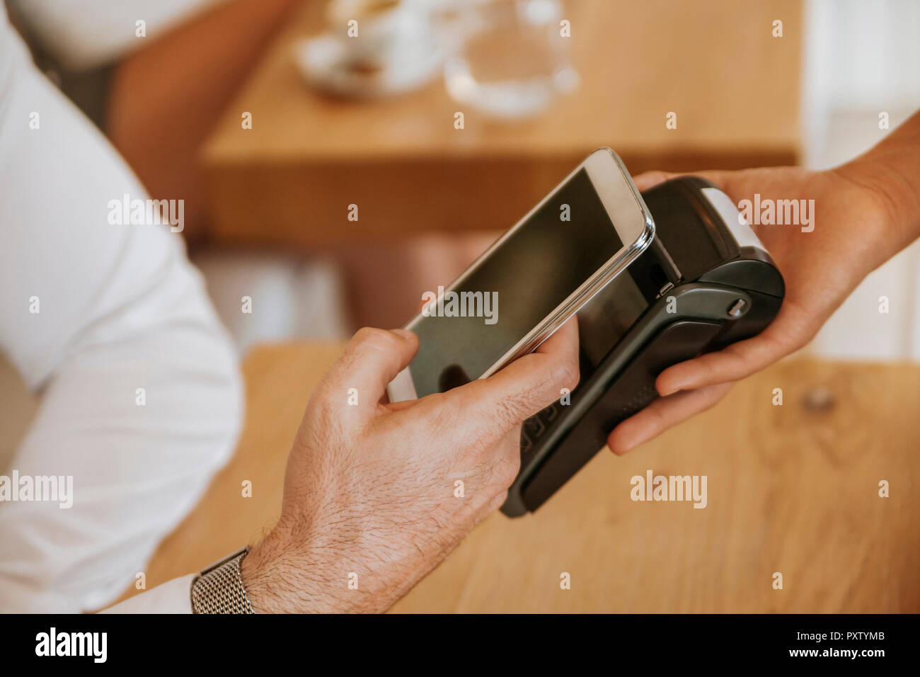 Contactless payment with smartphone hi-res stock photography and images ...