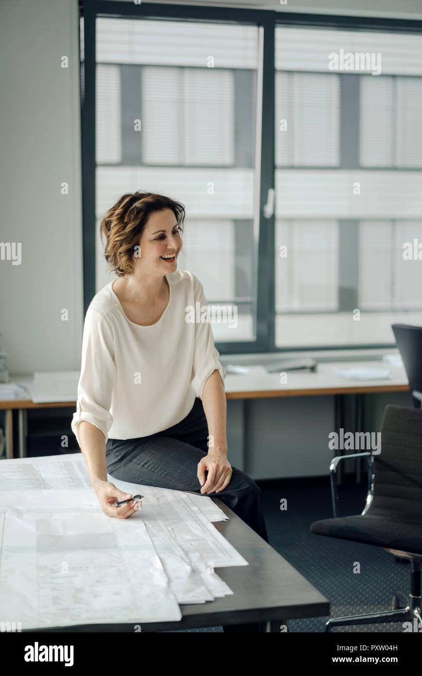 Engineer architect working on blueprints hi-res stock photography and ...