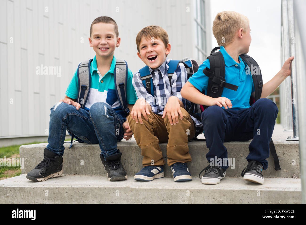 students outside school standing together on the day of school Stock ...