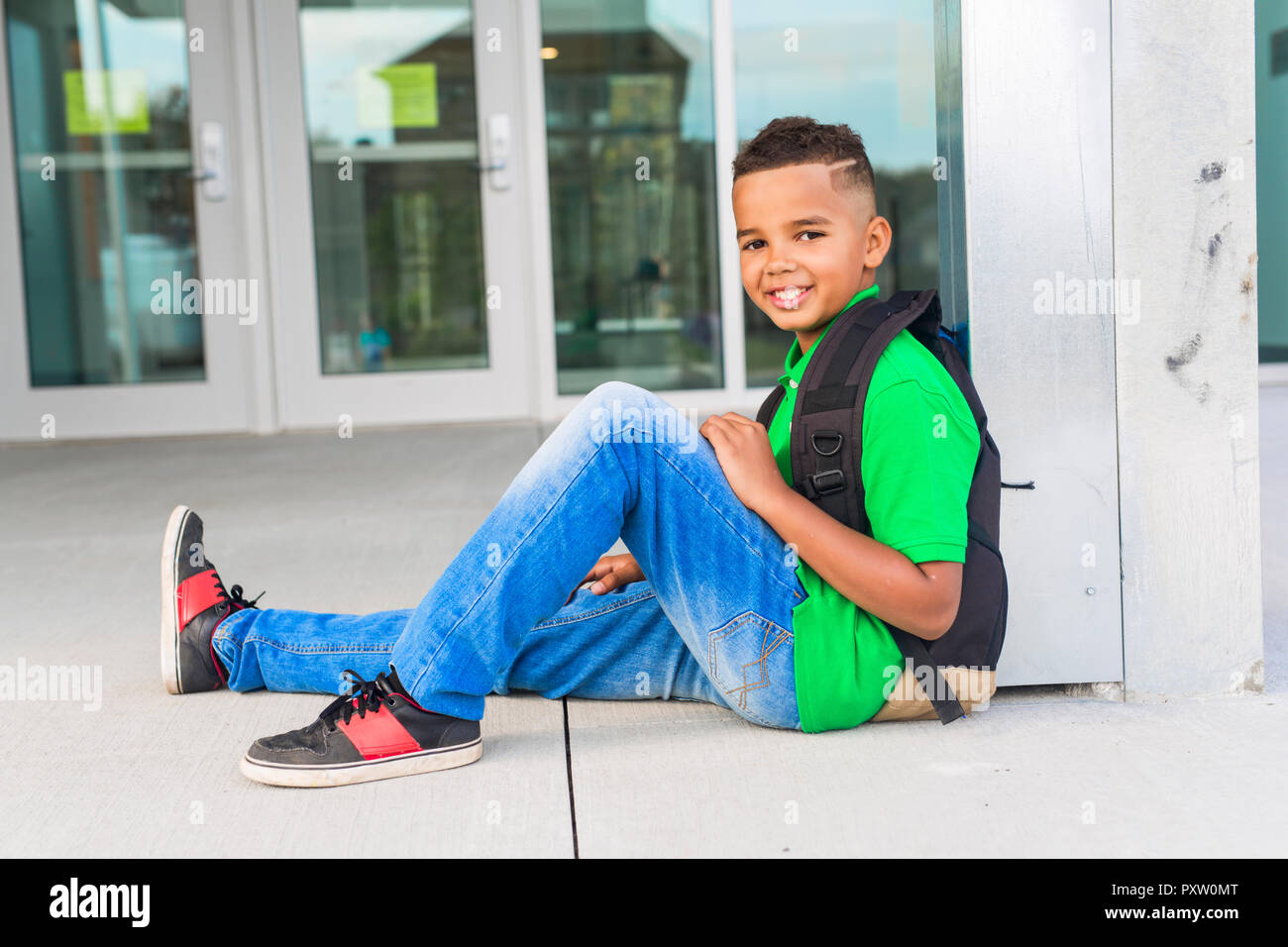 cheerful african american primary school boy with backpack Stock Photo ...