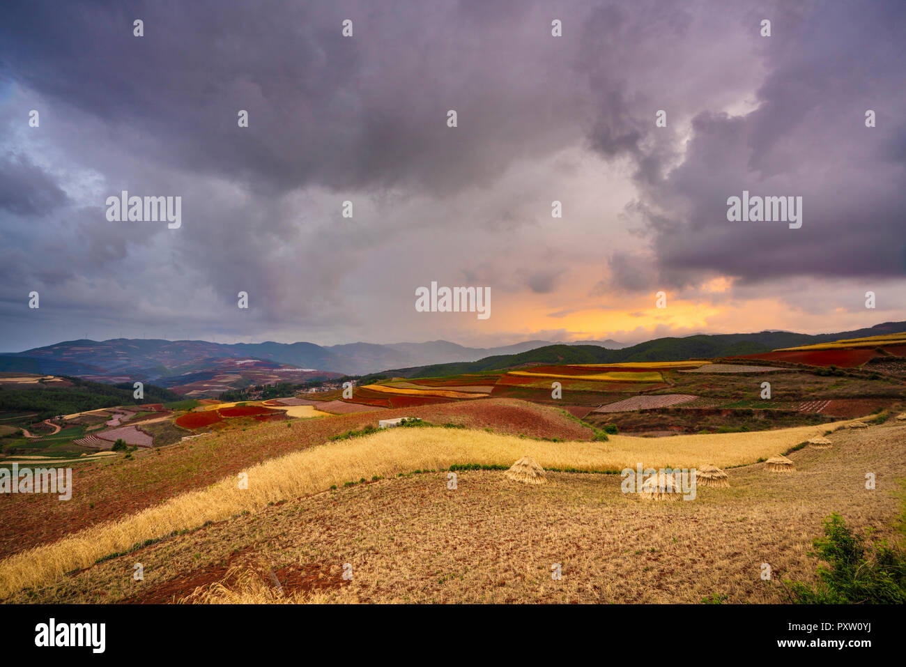 China, Yunnan province, Dongchuan, Red Land and dramatic sky Stock ...
