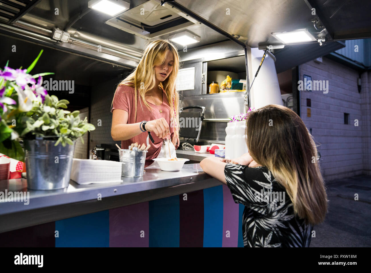 Serving clientele hi-res stock photography and images - Alamy