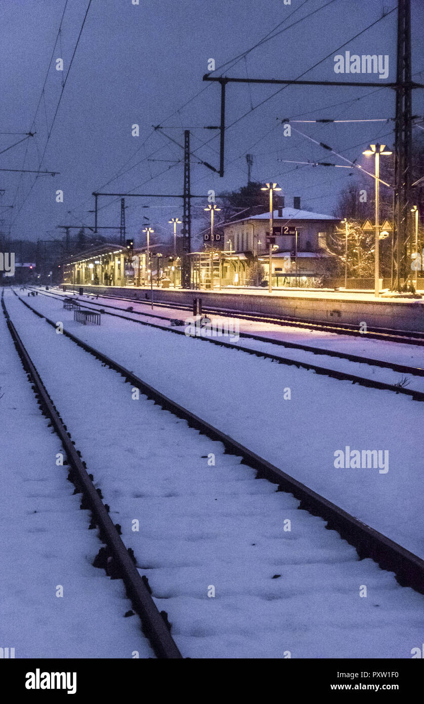 Train tracks and illuminated platforms hi-res stock photography and ...