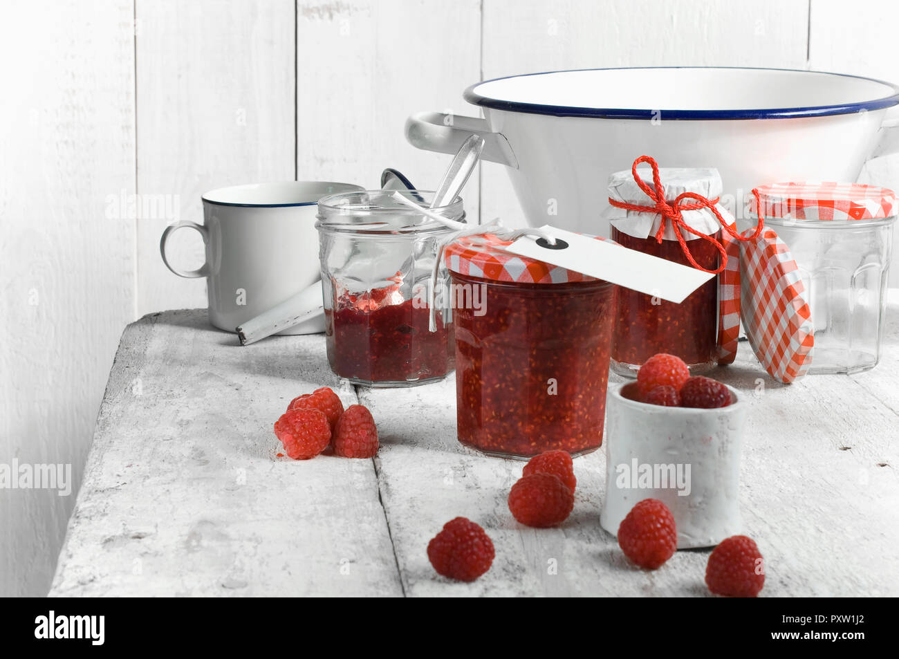 Jars of raspberry jam and raspberries Stock Photo - Alamy