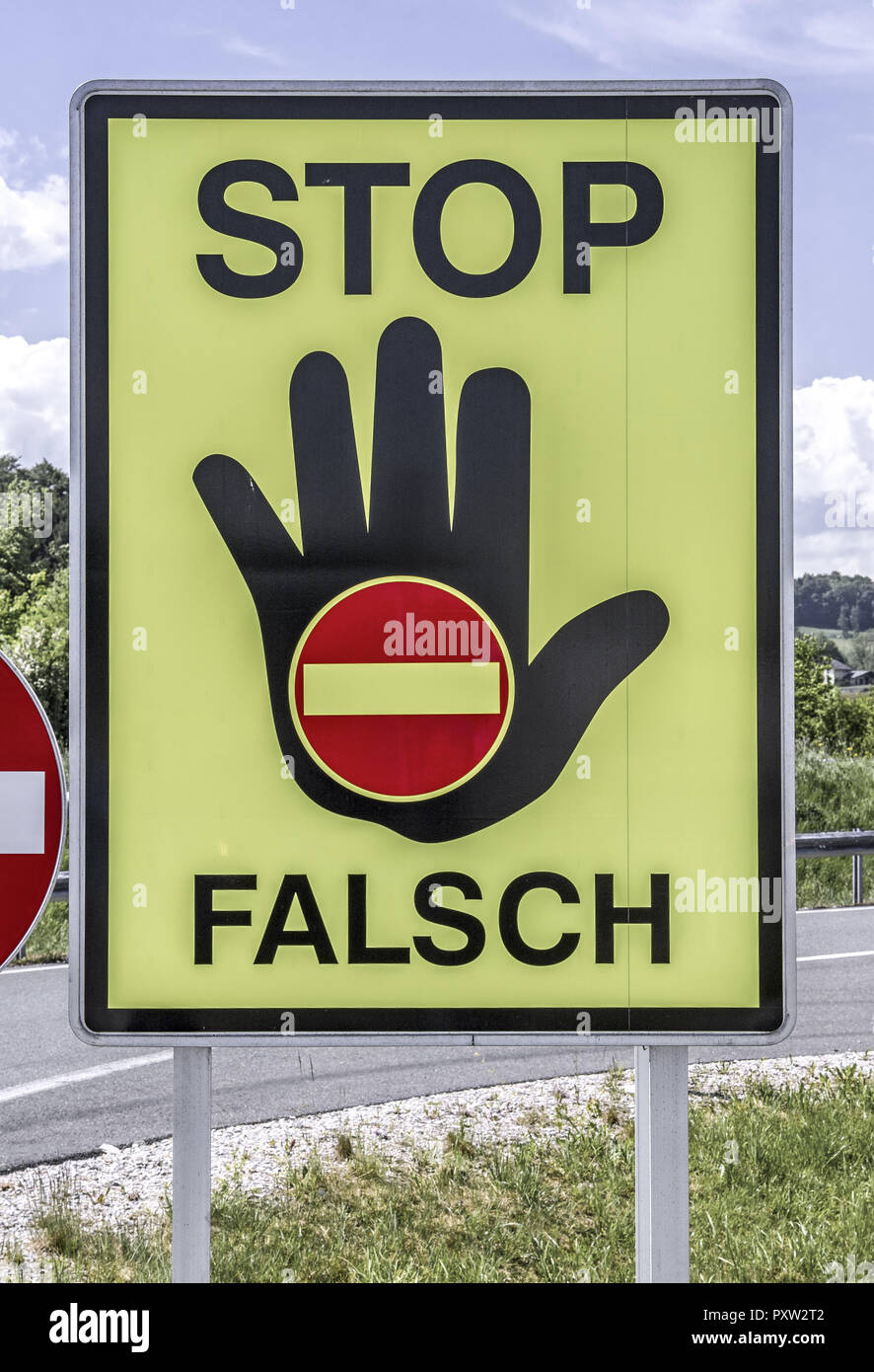 traffic sign stop, false direction, Austria Stock Photo - Alamy