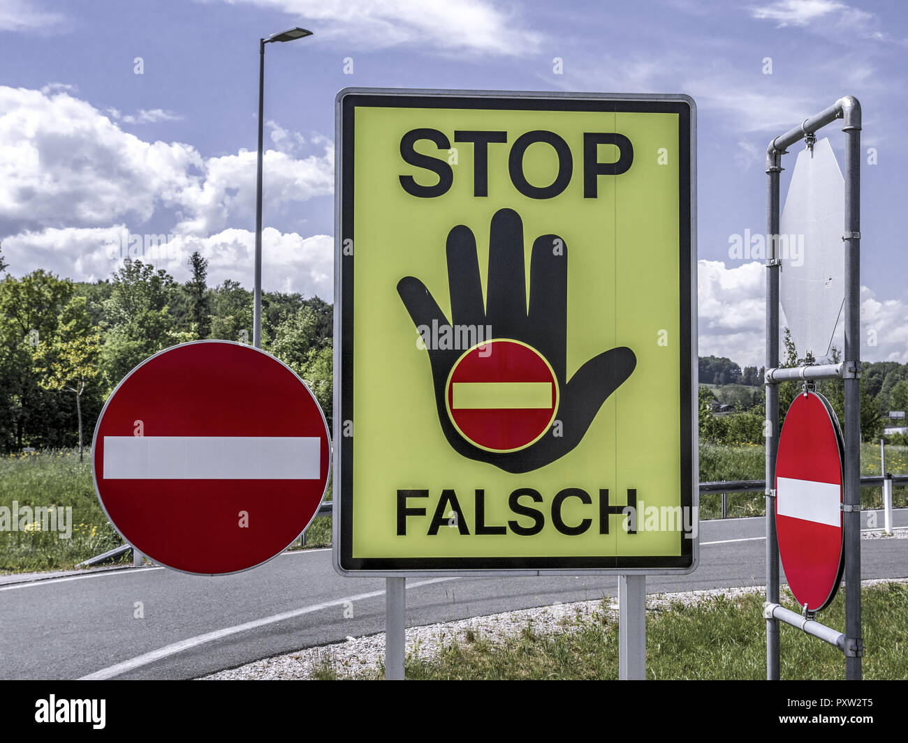 traffic sign stop, false direction, Austria Stock Photo - Alamy