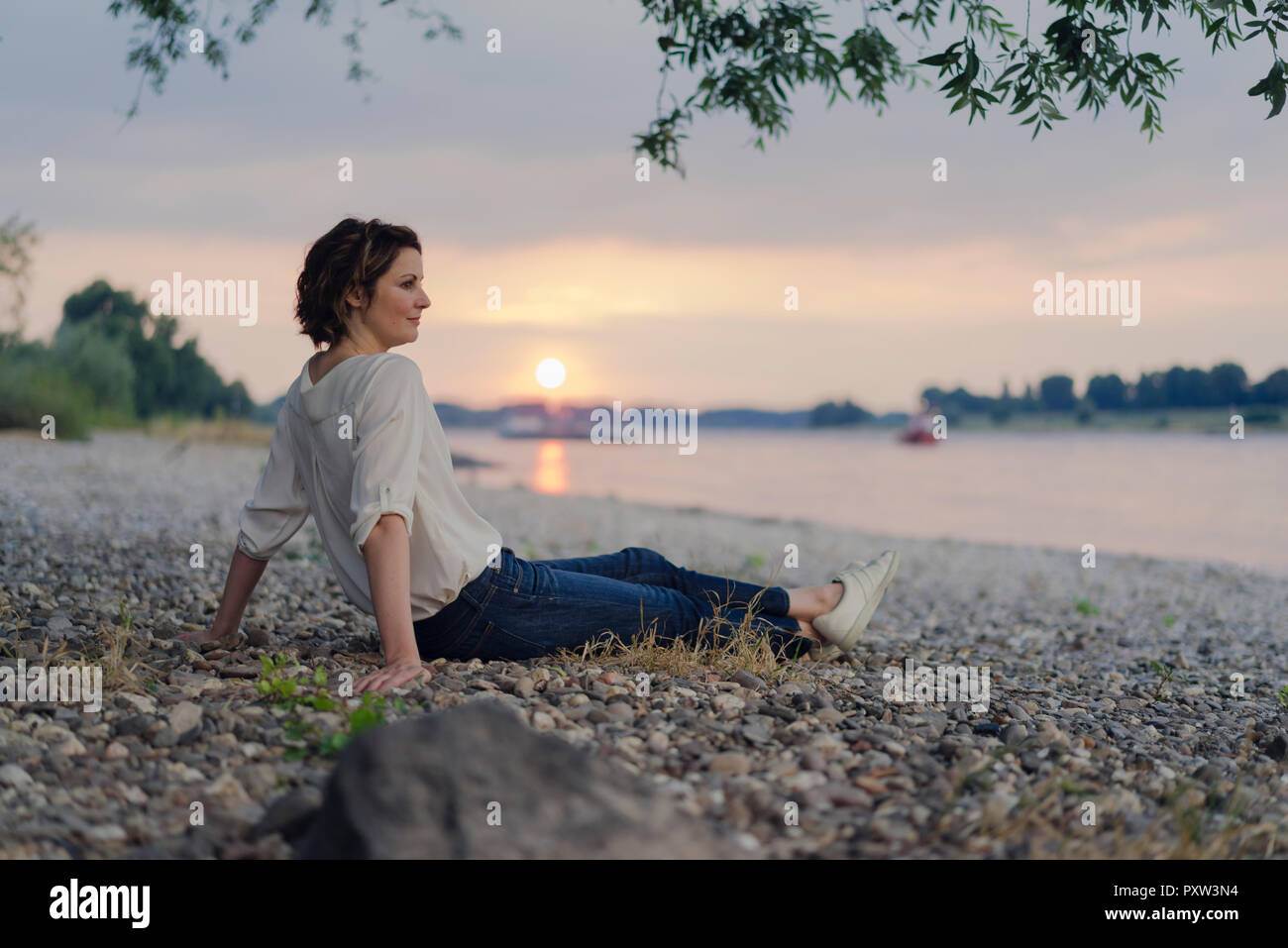 Woman river relaxing hi-res stock photography and images - Alamy