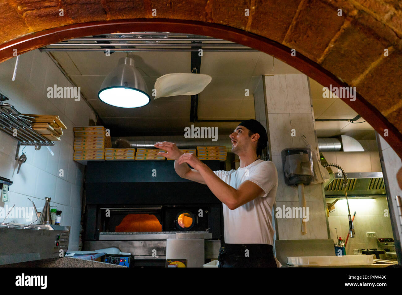 Baker throwing hi-res stock photography and images - Alamy