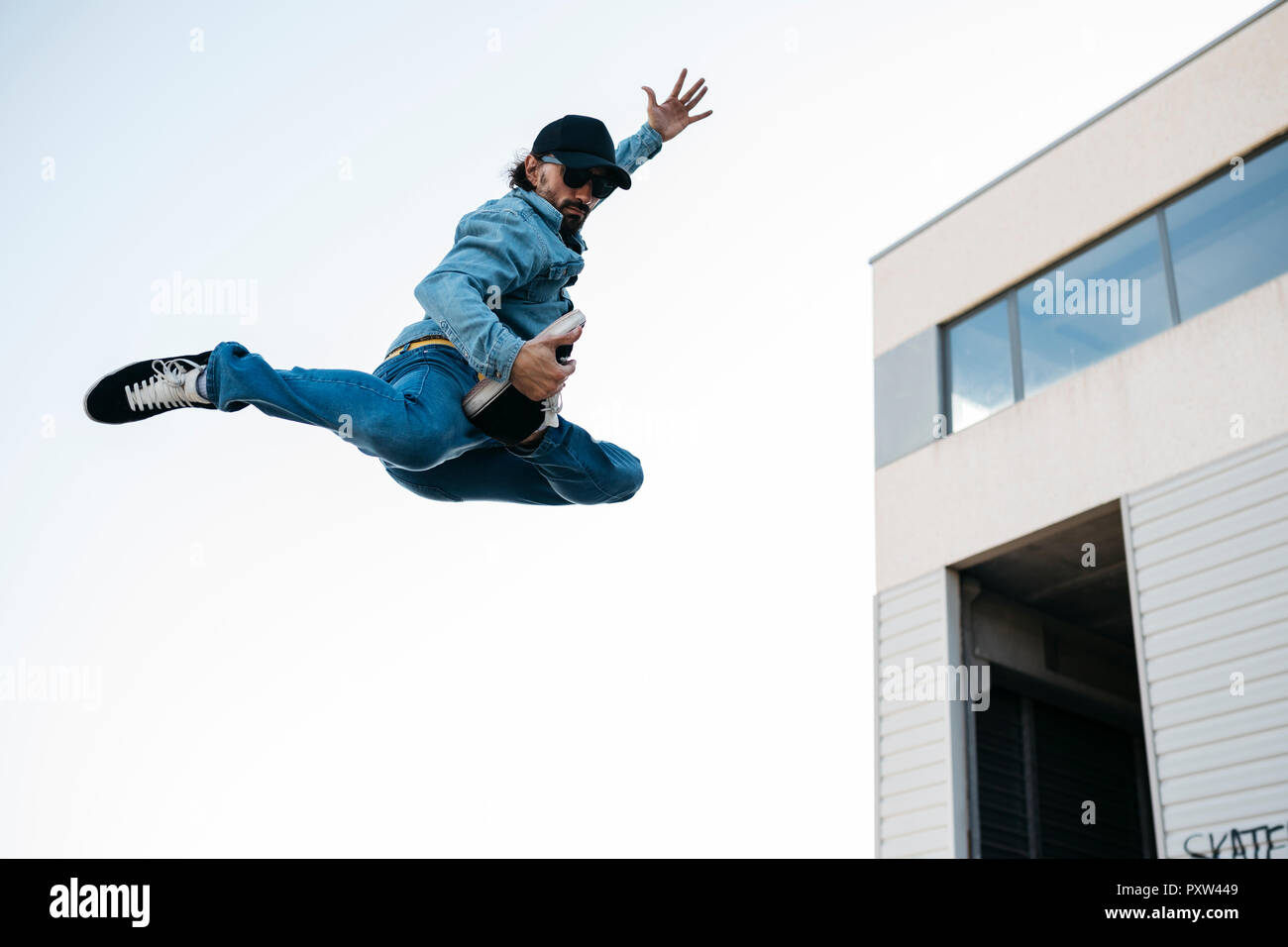 Man cap jump hi-res stock photography and images - Alamy