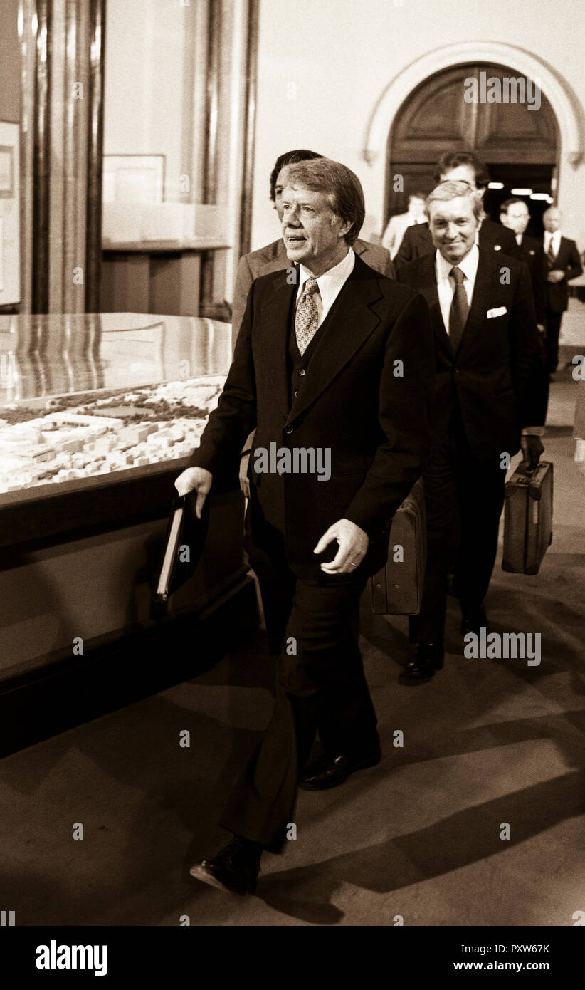 President Jimmy Carter and advisors walk into a meeting at The ...