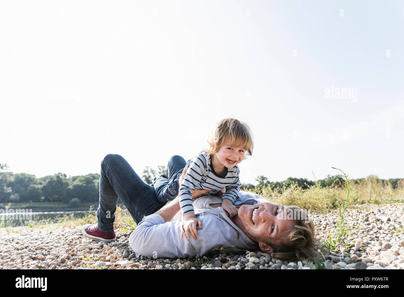 Father son having fun riverside hi-res stock photography and images - Alamy