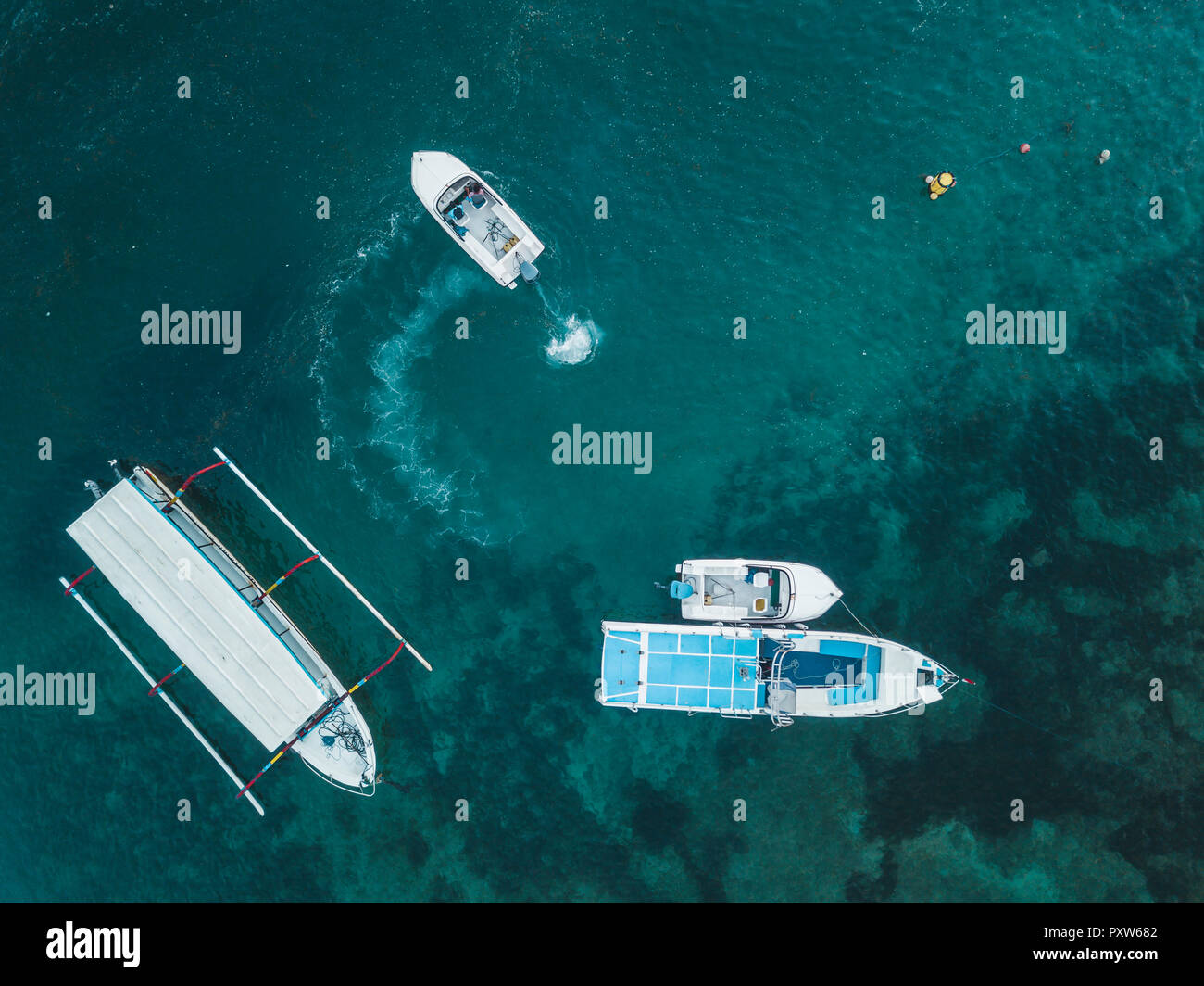 Indonesia, Bali, Aerial view of motorboats from above Stock Photo - Alamy