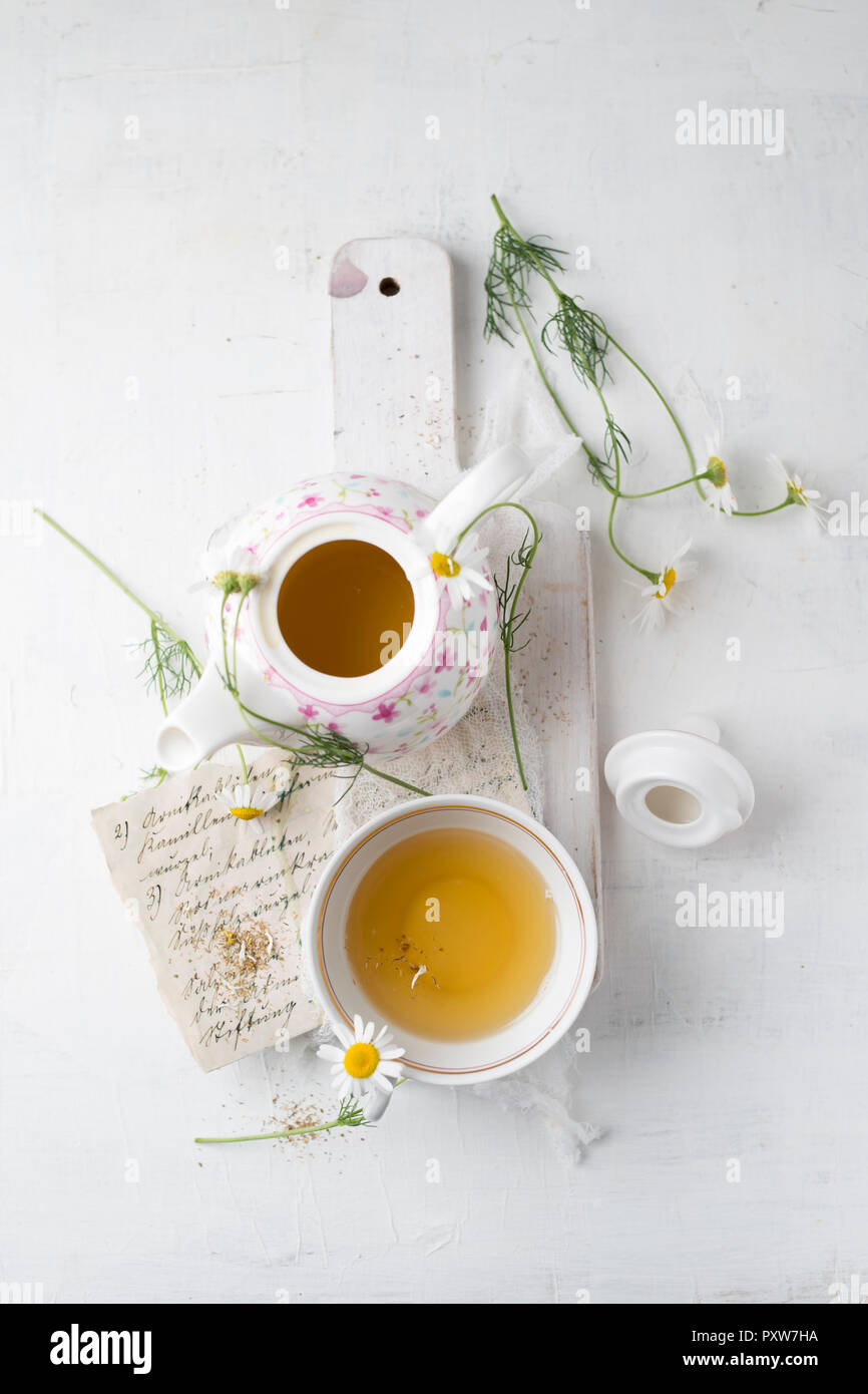 Chamomile tea in pot and cup Stock Photo - Alamy