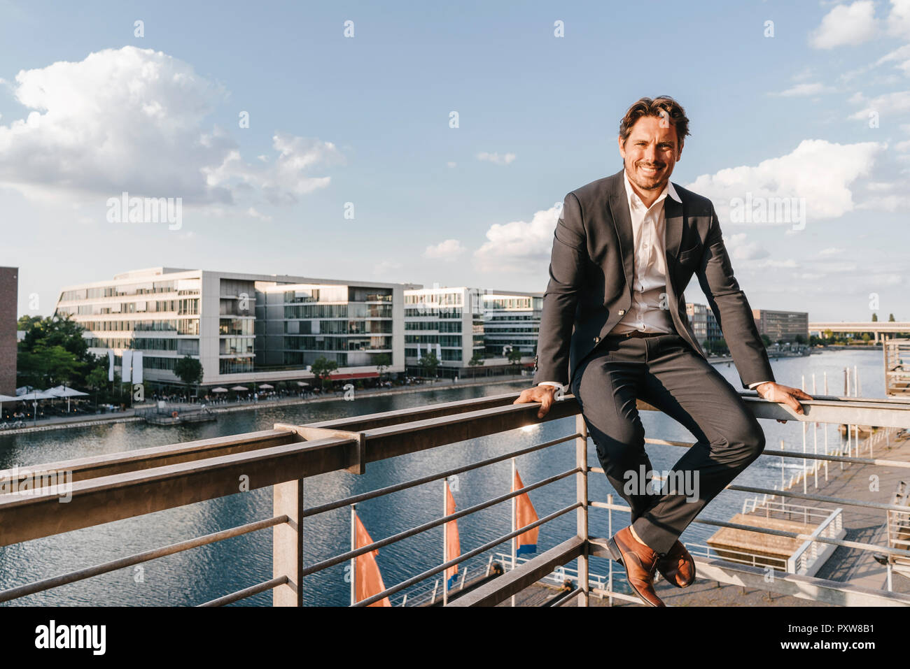 Man Sitting On Balcony High Resolution Stock Photography and Images - Alamy