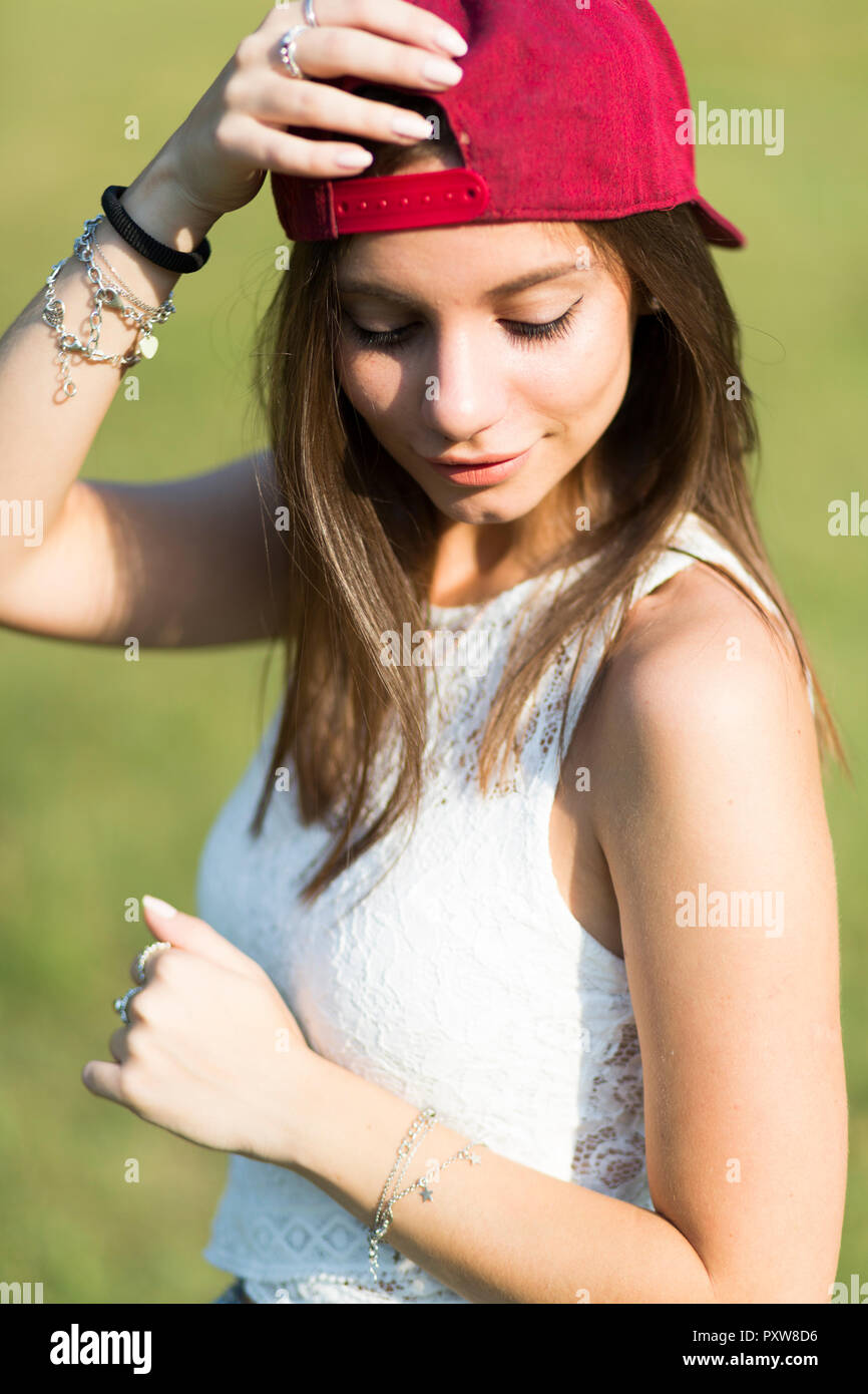 Portrait woman wearing baseball cap hi-res stock photography and images ...