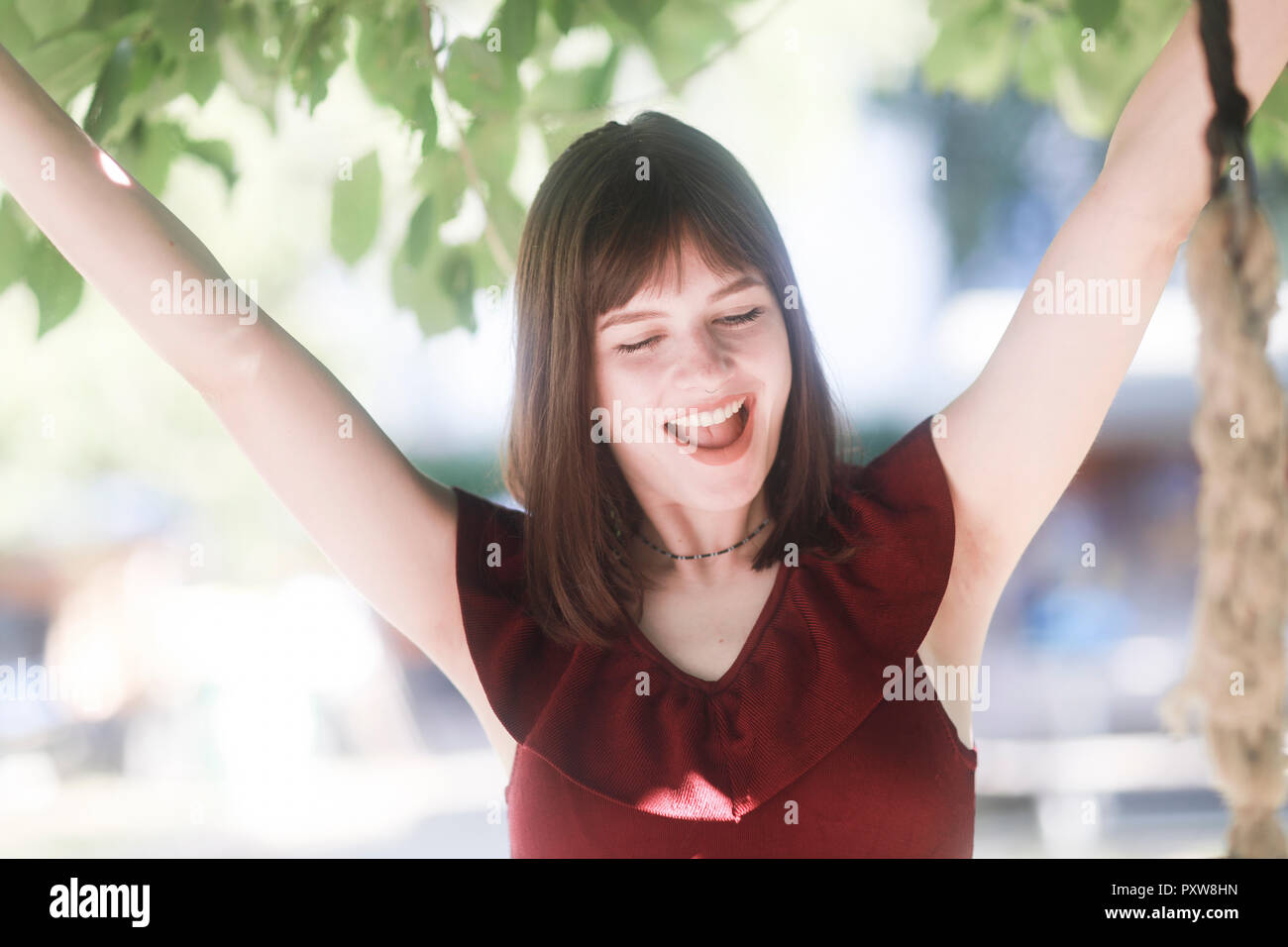 Holding on to tree hi-res stock photography and images - Alamy