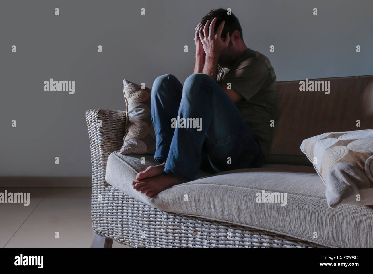 lifestyle dramatic light portrait of young sad and depressed man ... lifestyle dramatic light portrait of young sad and depressed man ...