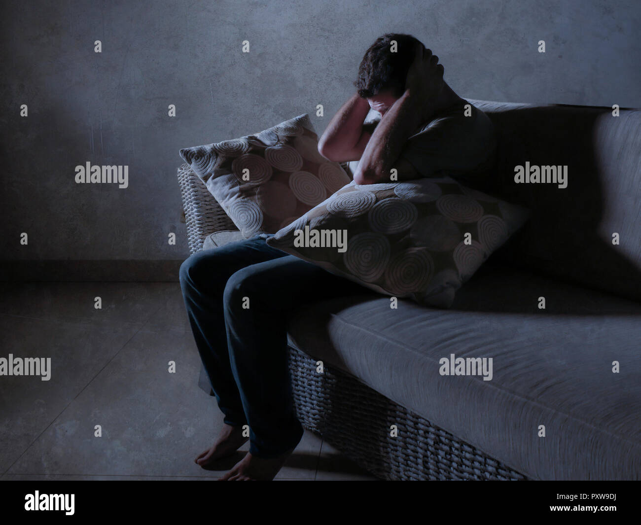 lifestyle dramatic light portrait of young sad and depressed man ... lifestyle dramatic light portrait of young sad and depressed man ...