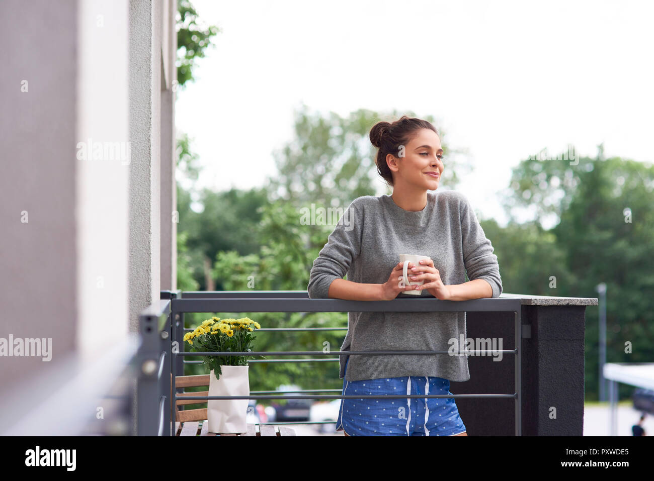 Drinking coffee on the balcony hi-res stock photography and images - Alamy